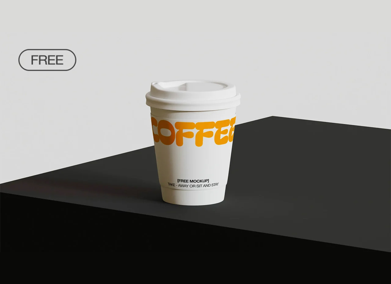 Coffee Cup On Table Mockup - GraphicsBunker